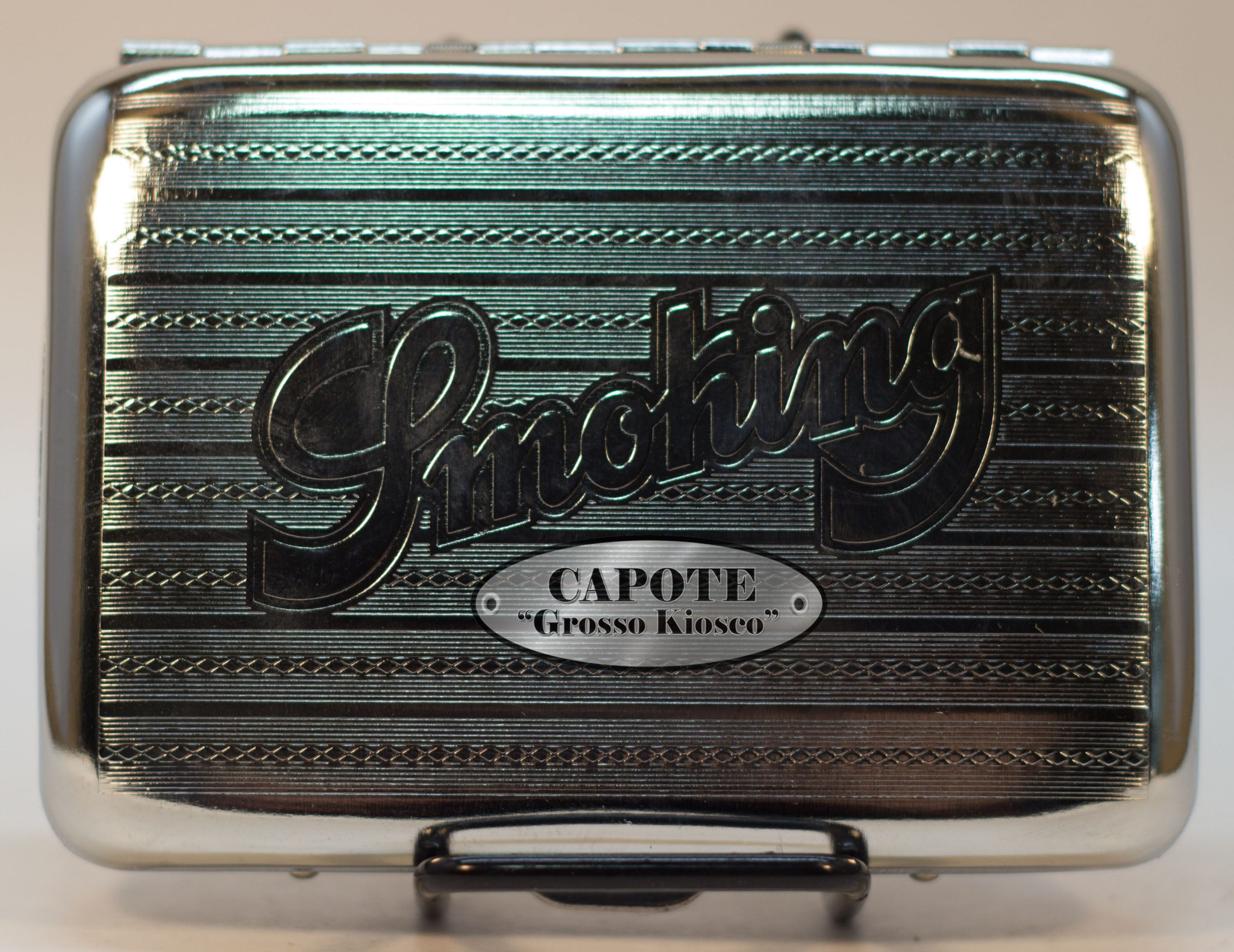 Cigarreras – Capote Grosso Kiosco